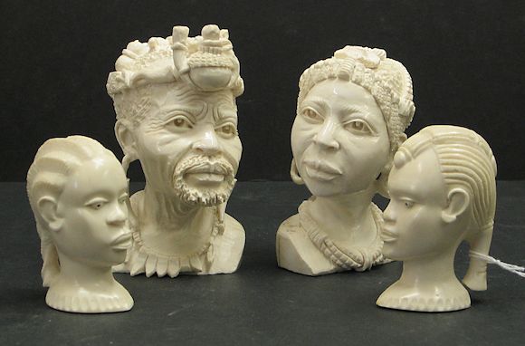 Bonhams : Four African carved ivory portraits