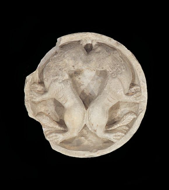 Bonhams : An Italian Romanesque carved Istrian marble roundel