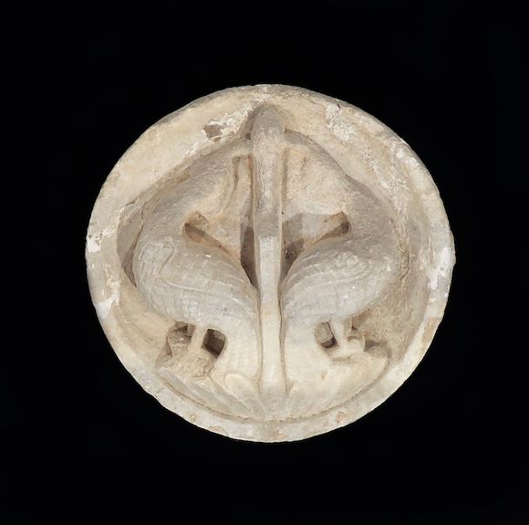 Bonhams : An Italian Romanseque carved Istrian marble roundel