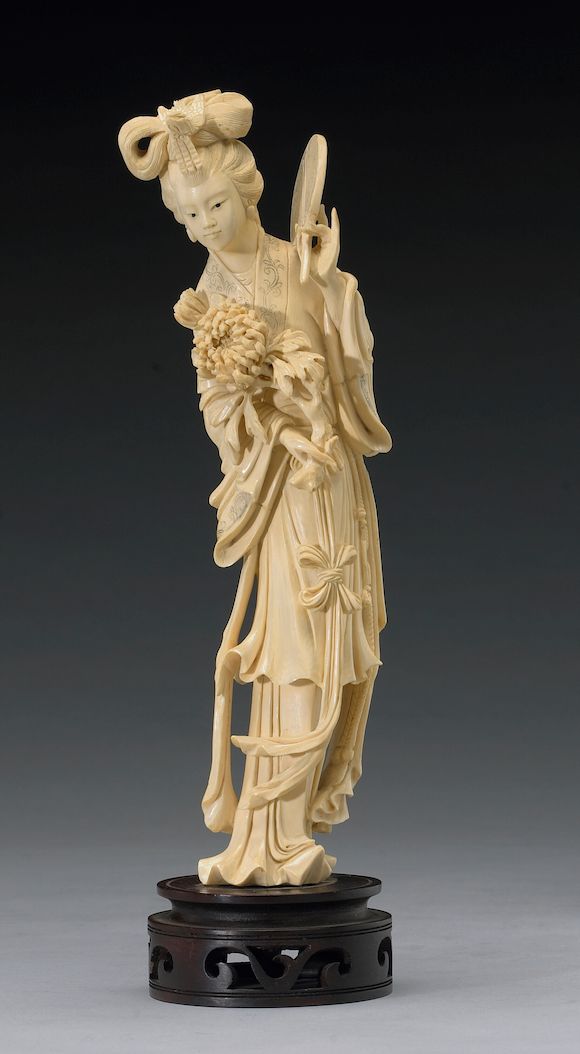 Bonhams : An ivory figure of a beauty 20th Century