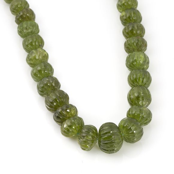 Bonhams : Carved Peridot Bead Necklace