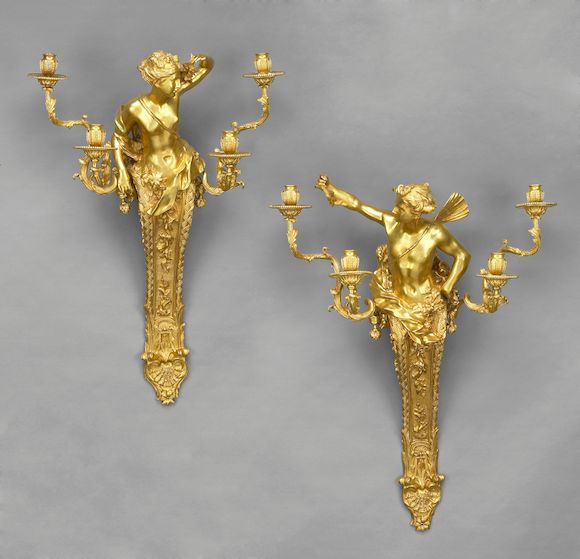 Bonhams : A pair of Louis XVI style gilt bronze figural bras de lumiere