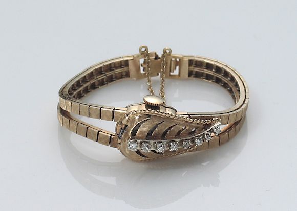 Bonhams : A diamond and 14k gold covered watch, Eloga