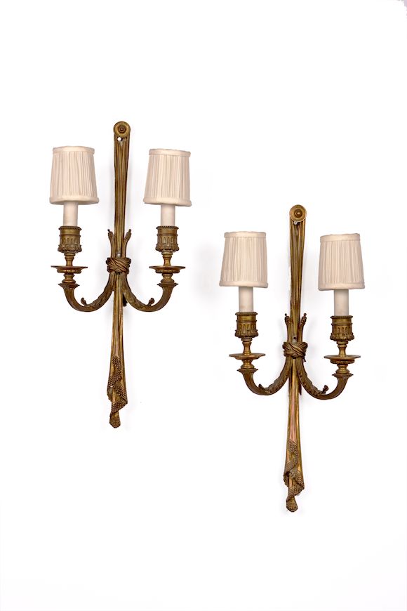 Bonhams : A set of four Louis XVI style gilt-bronze two-light bras de ...