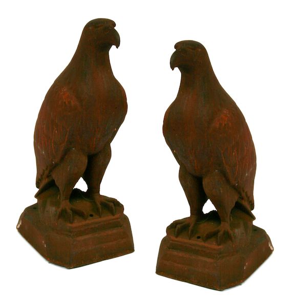 Bonhams : A pair of cast iron figures of falcons