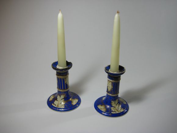 Bonhams : A pair of Staffordshire dwarf candlesticks