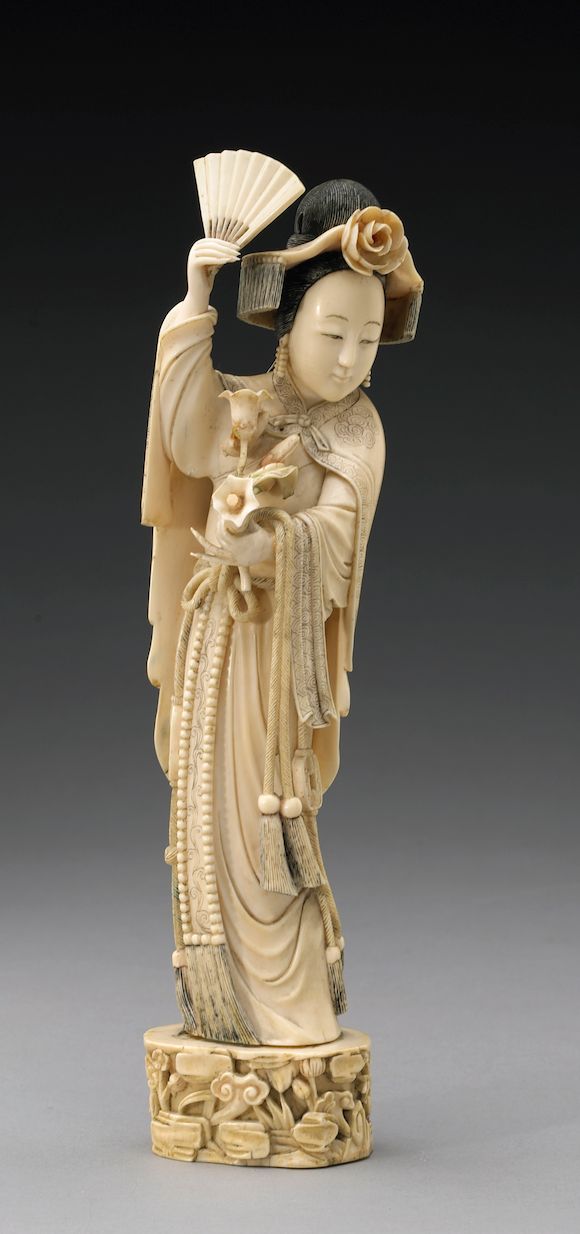 Bonhams : A tinted ivory standing beauty 19th Century