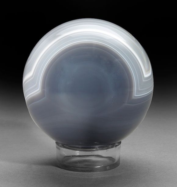 Bonhams : Chalcedony, variety agate, polished sphere