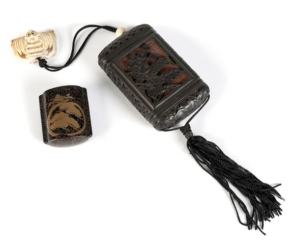 Bonhams : A black and red lacquer inro with ivory bat netsuke