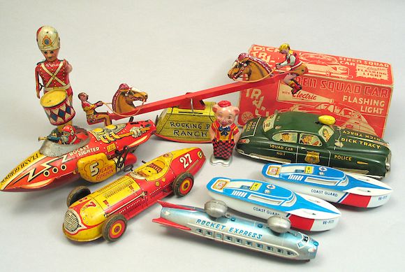 Bonhams : A collection of nine American wind-up lithographed tin toys
