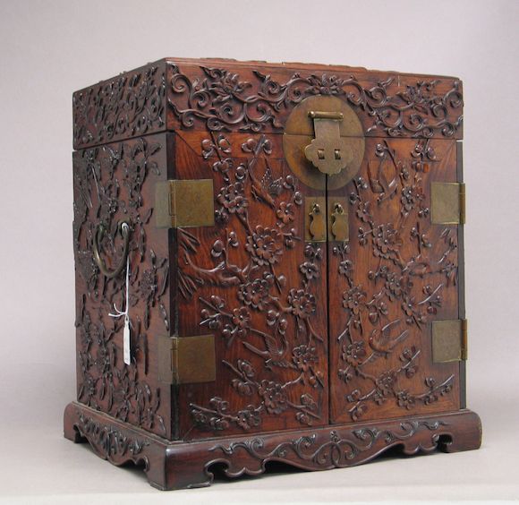 Bonhams : A carved hard wood vanity box