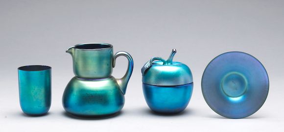 Bonhams : A Steuben blue aurene glass 'tumble-up' and an apple-form box ...