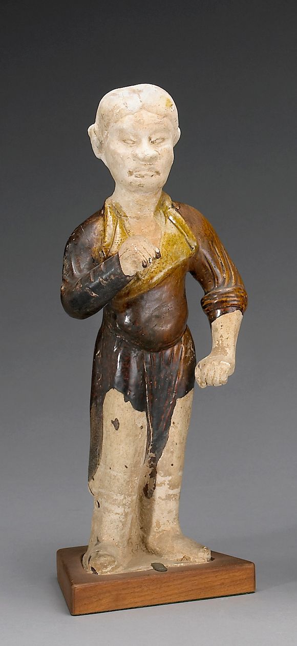 Bonhams : A glazed pottery burial figure Tang Dynasty