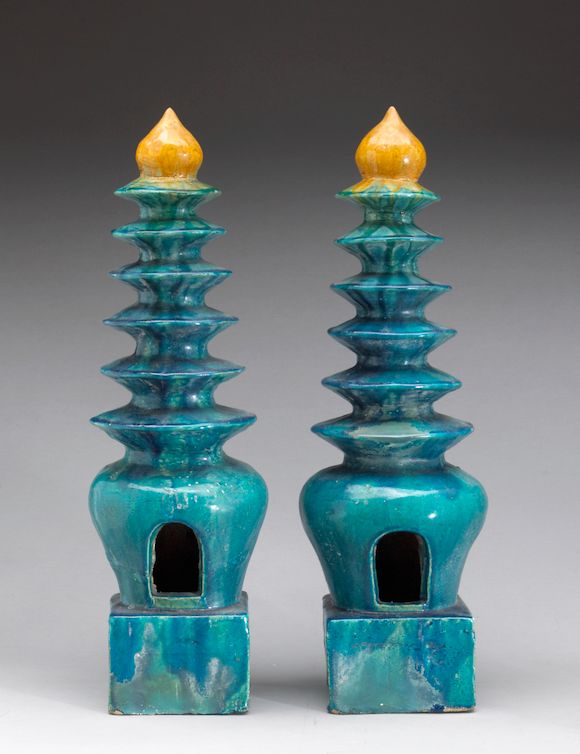 Bonhams : A pair of turquoise and yellow glazed pottery models of ...
