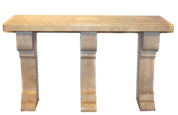 Bonhams : A pair of limestone console tables with three piers