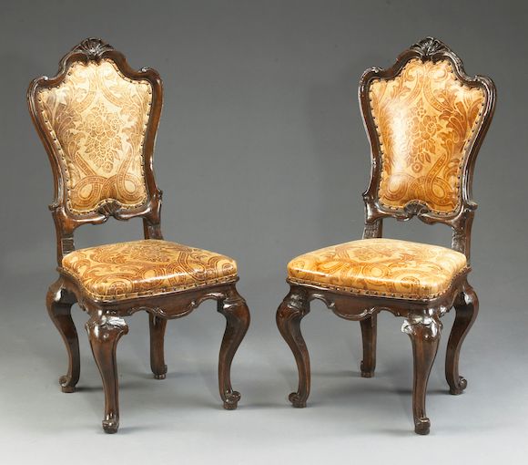 Bonhams : A rare set of twelve Italian Rococo leather upholstered ...