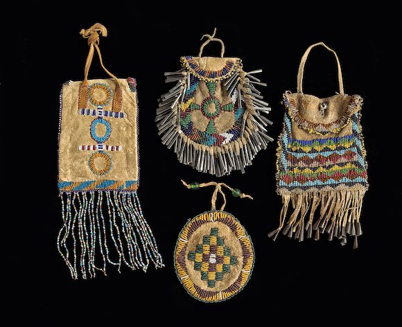Bonhams : Four Apache beaded pouches