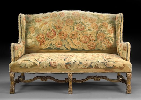 Bonhams : A Louis XIV style carved giltwood canapé