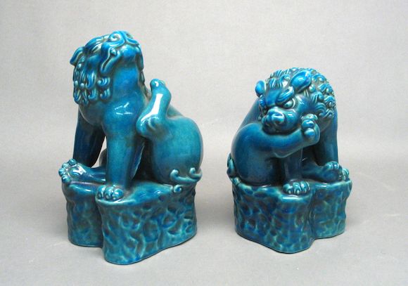 Bonhams : A pair of turquoise blue glazed fu lions Late Qing/Republic ...