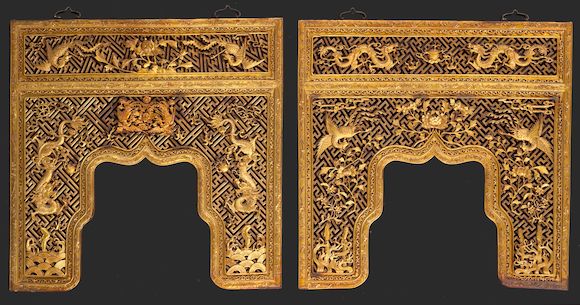 Bonhams : A pair of red and gilt-painted wood hanging panels 20th Century