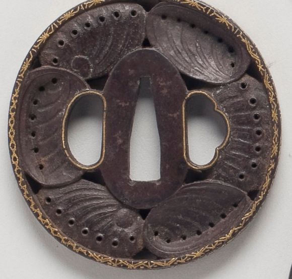 Bonhams : A Bushu style iron tsuba with awabi shells 19th Century