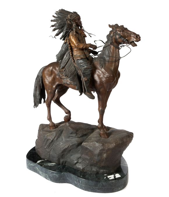 Bonhams : A cold painted bronze figural group of a Native American on ...