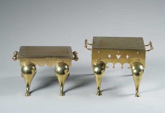 Bonhams : An English brass footman trivet and an English bronze footman ...