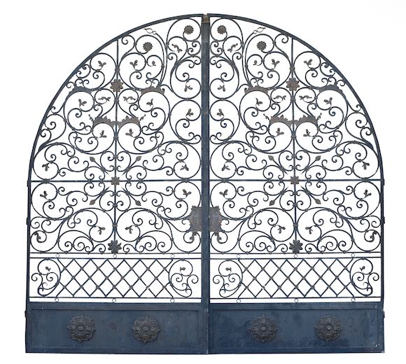 Bonhams : A monumental pair of wrought iron, parcel gilt and tôle gates