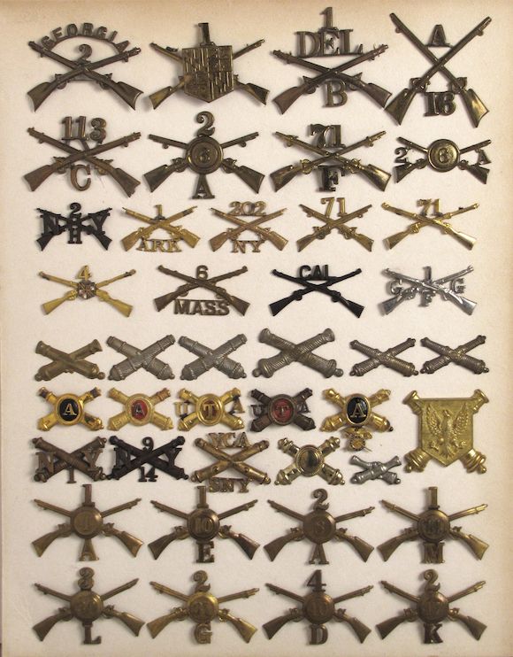 Bonhams : A group of militia infantry and artillery cap and collar insignia