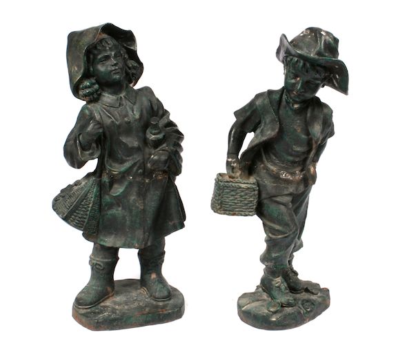 Bonhams : A pair of patinated cast iron figures of children