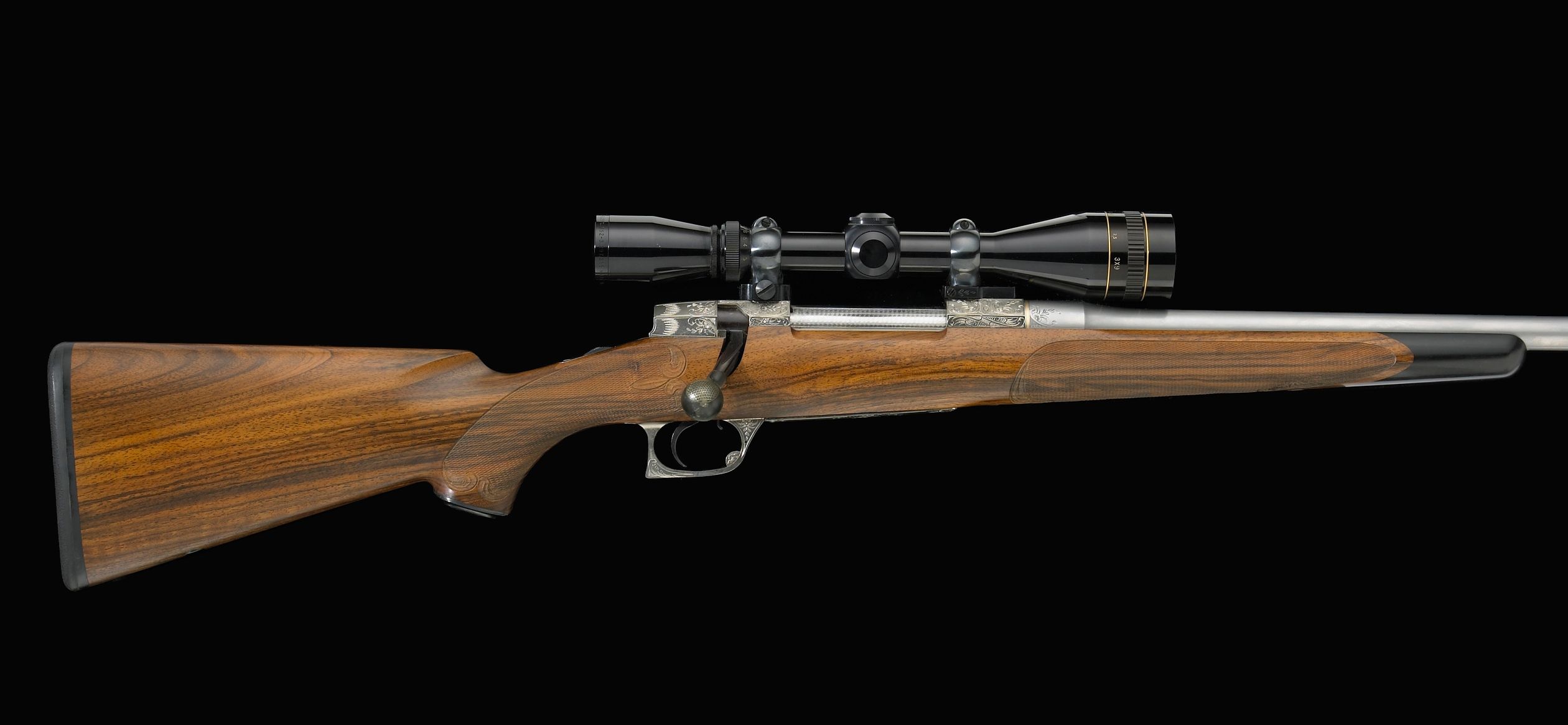 A .240 Weatherby Magnum Champlin Firearms bolt action sporting rifle ...