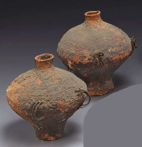 Bonhams : A pair of Apache water bottles