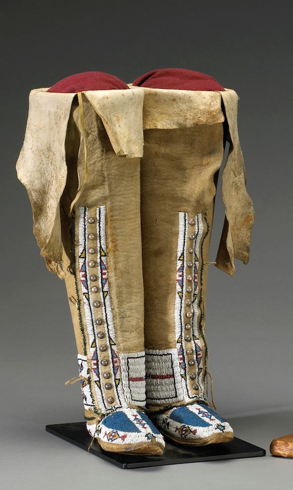 Bonhams : A pair of Southern Cheyenne beaded hightop moccasins