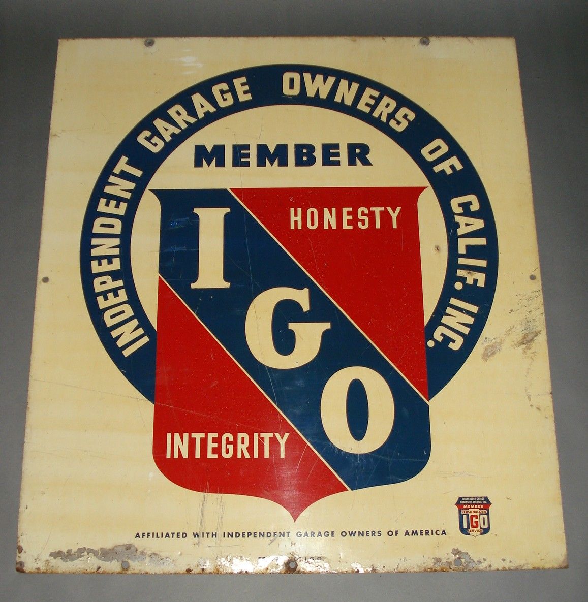 Bonhams Cars : An Independent Garage Owners sign,