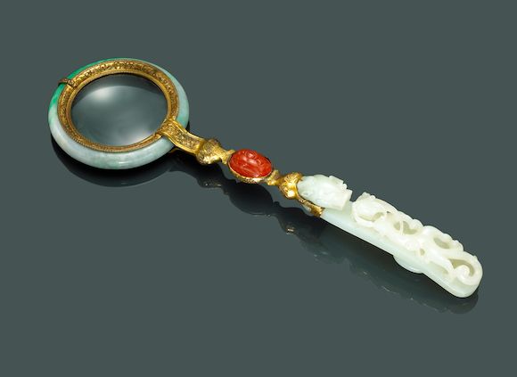 Bonhams : A metal, jade and carnelian-mounted magnifying glass