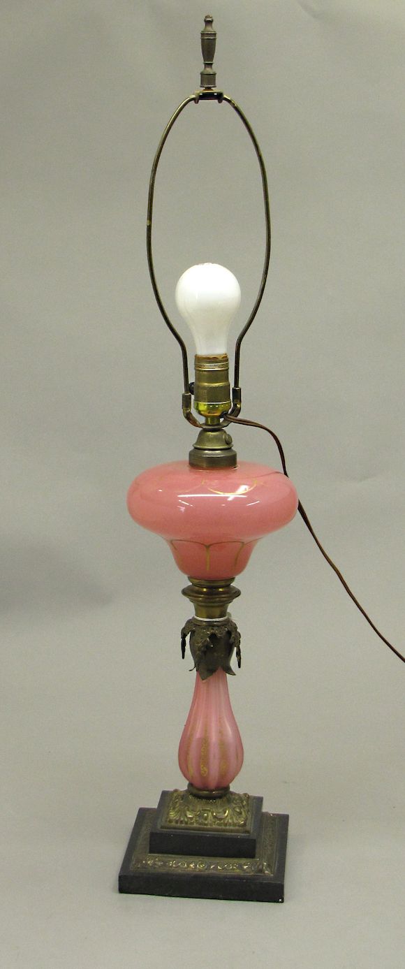 Bonhams : A Victorian pink opaque glass, gilt brass and slate oil lamp