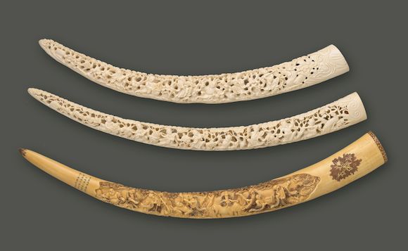 Bonhams : A large tinted ivory tusk with figural decoration 20th Century