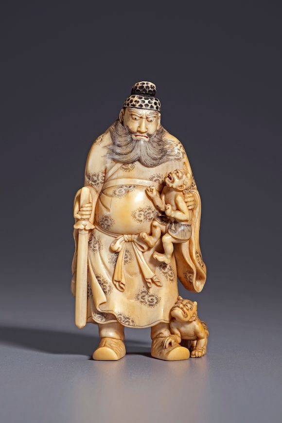 Bonhams : Ivory netsuke of Shoki By Ikkosai Toun (Edo, mid 19th century)
