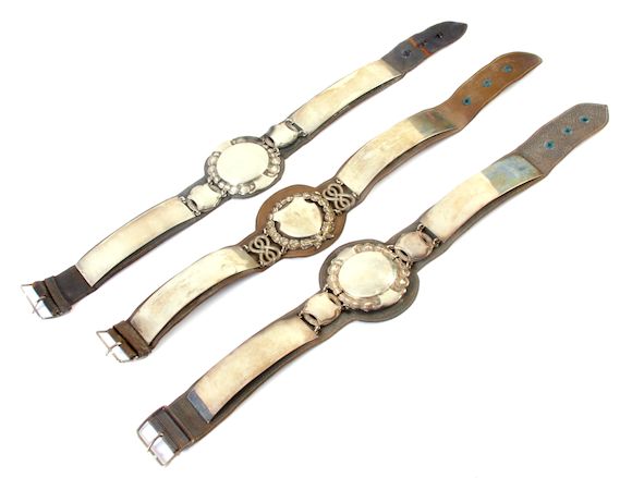 Bonhams : A group of three British silver and leather cased collars