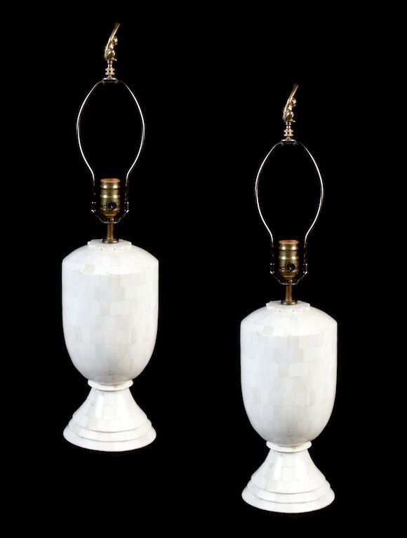 Bonhams : A pair of bone veneered table lamps with monkey finials