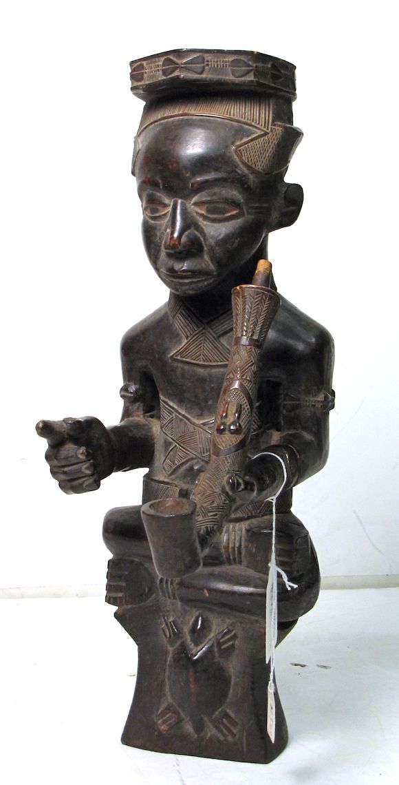 Bonhams : A contemporary Kuba carving depicting a royal figure
