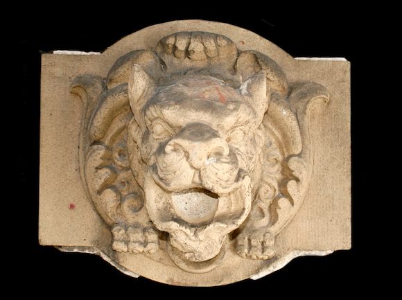 Bonhams : A pair of cast stone gargoyles in the form of leopard heads