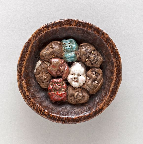 Bonhams : Wood and pottery netsuke of masks By Teiji (Edo/Tokyo, 1800-1865)