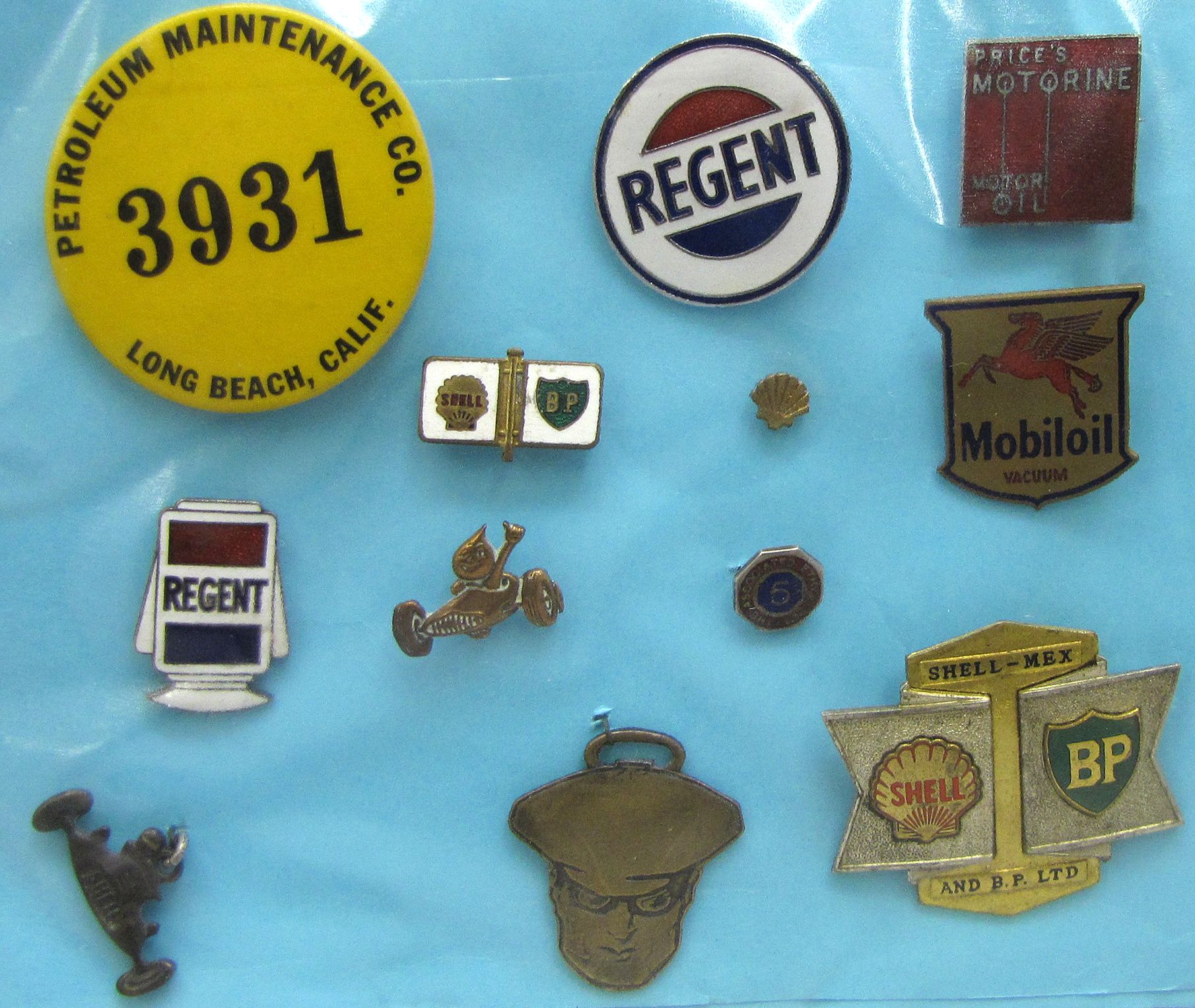 Bonhams Cars : Twelve Gas and Oil, lapel badges, pins and fobs,