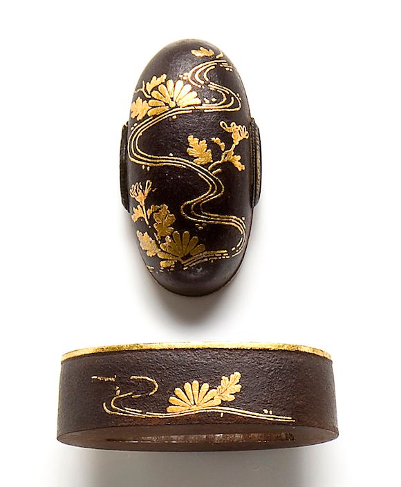 Bonhams : A PAIR OF HIGO-SCHOOL FUCHI-GASHIRA Edo period (19th century)