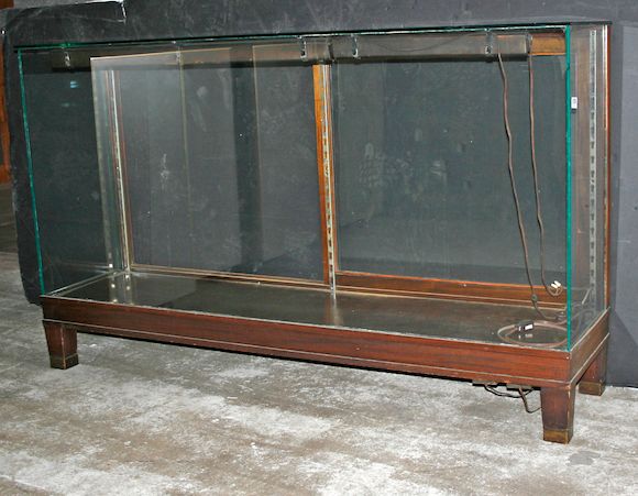 Bonhams : A glass and wood horizontal display cabinet