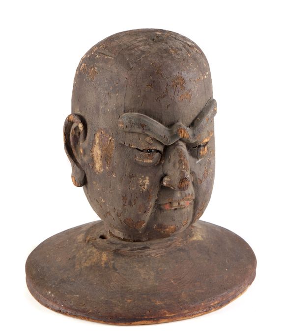 Bonhams : A Chinese carved wood head