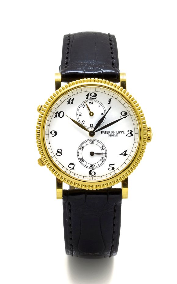 Bonhams : Patek Philippe. A fine 18K gold two time zone ...