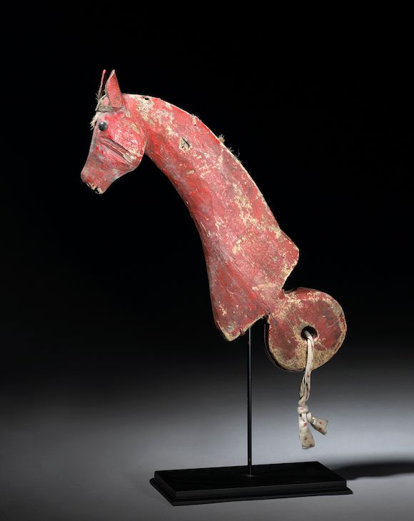 Bonhams : A Blackfoot horse effigy stick