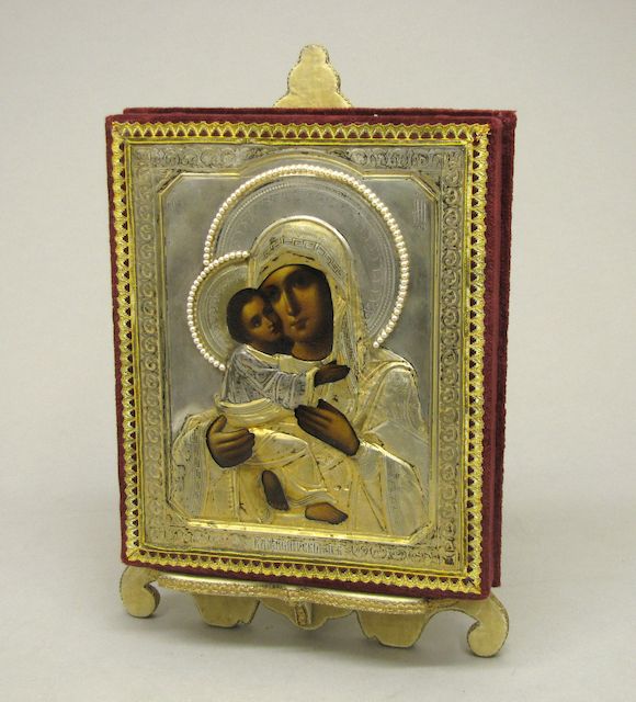 Bonhams : A Russian painted wood icon with silver gilt and beaded oklad ...